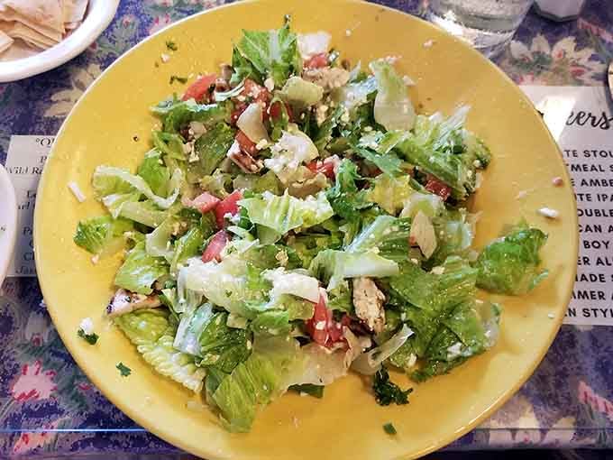 This sesame-topped chicken salad is so vibrant and fresh, it practically photobombs every other dish on the table.