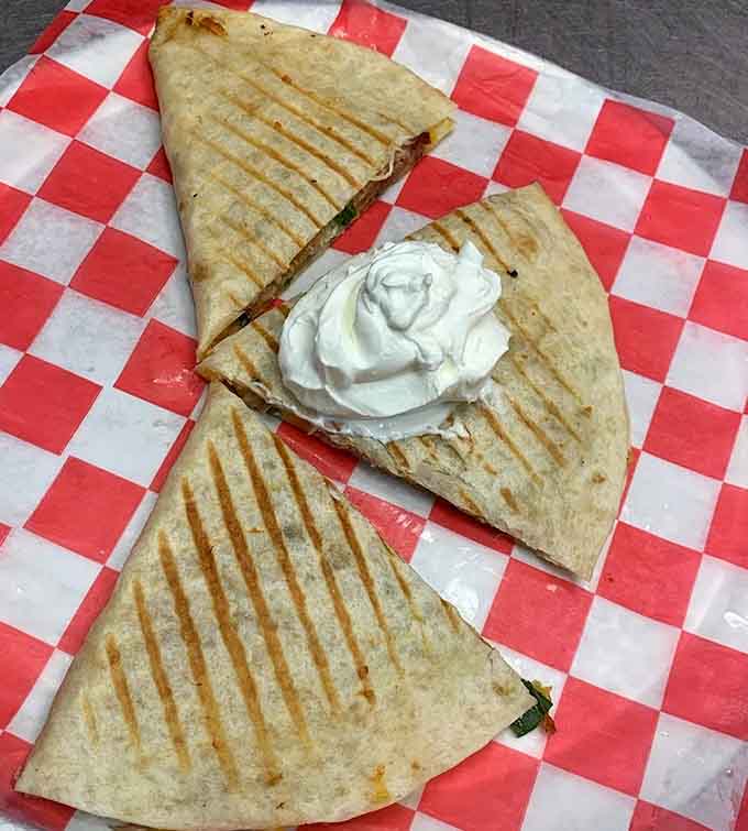 Quesadillas grilled to golden perfection, because sometimes you need your barbecue wrapped in melted cheese.