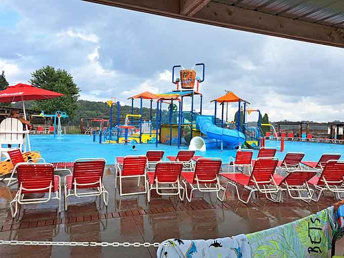 Rows of red chairs await tired parents who've earned their rest after chasing energetic water-loving youngsters.