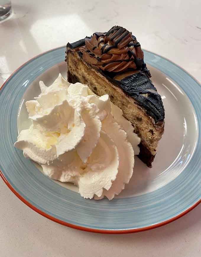 Peanut butter cheesecake with whipped cream: because sometimes dessert needs to be an event, not an afterthought.