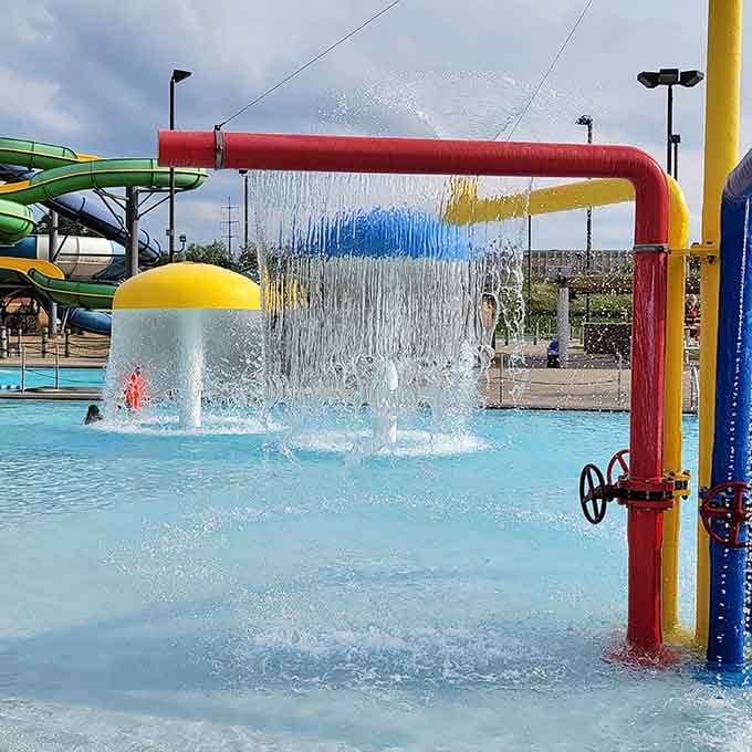 Bright pipes and playful structures create a water playground that looks like Dr. Seuss designed an aquatic theme park.