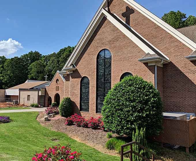 Manicured landscaping and soaring windows suggest a community that takes pride in both faith and curb appeal with equal devotion.