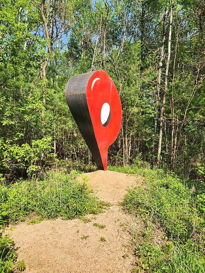 This oversized red pin marks the spot where art and nature meet for their regular coffee date.