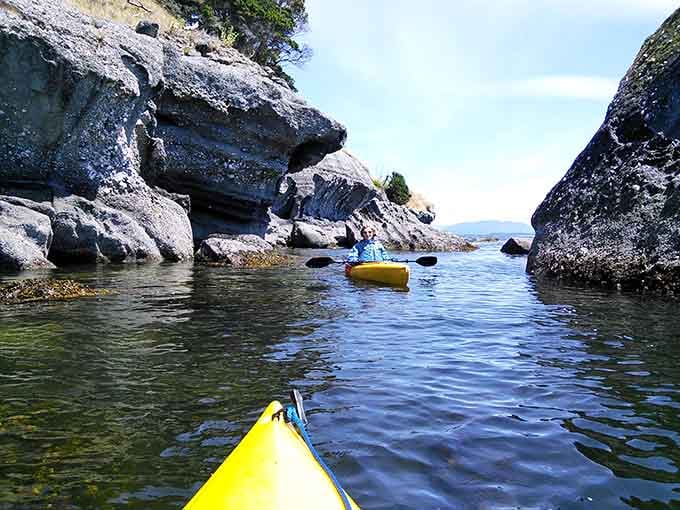 Paddling through narrow passages between towering rocks feels like discovering Narnia, but with better weather and no talking lions.