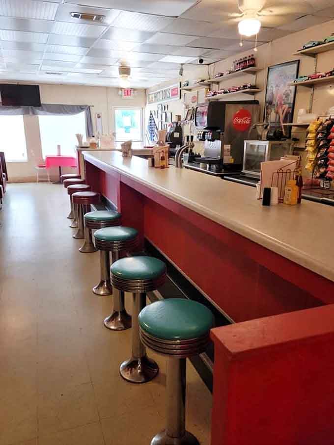 Classic diner counter with those iconic swivel stools where countless conversations and meals have happened over the years.