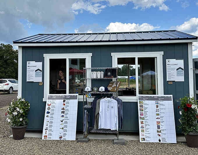 Even the merch shed looks charming, because when you've nailed the backyard vibe, every detail counts beautifully.