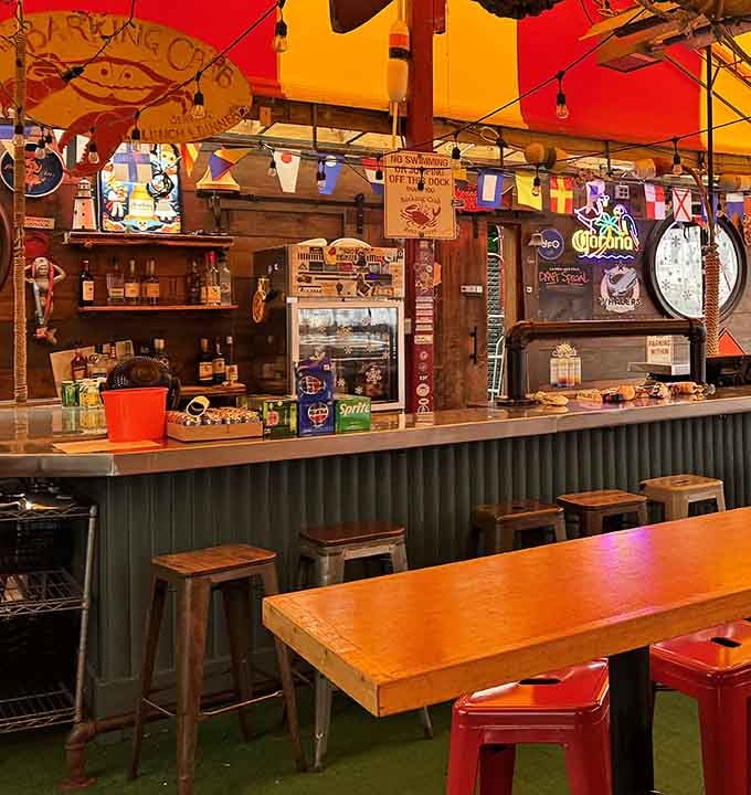 The bar area where nautical charm meets neighborhood hangout, and nobody's complaining about the combination at all.