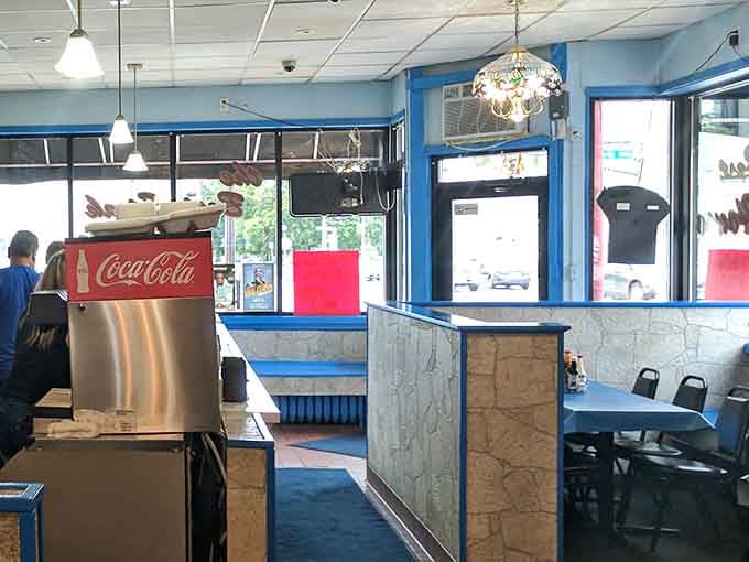 That vintage Coca-Cola dispenser adds nostalgic charm to a space designed for efficient, friendly service and great food.