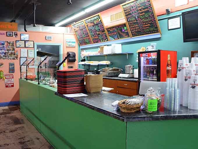 The order counter where dreams become burritos, featuring menu boards that could double as works of caffeinated folk art.