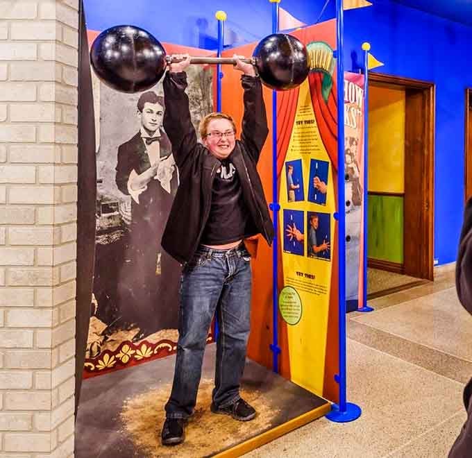 Strike a strongman pose next to vintage circus imagery and channel your inner vaudeville performer for the camera.