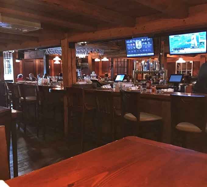 The bar area maintains that authentic barn charm while serving up drinks that taste like they were mixed by someone who actually cares.