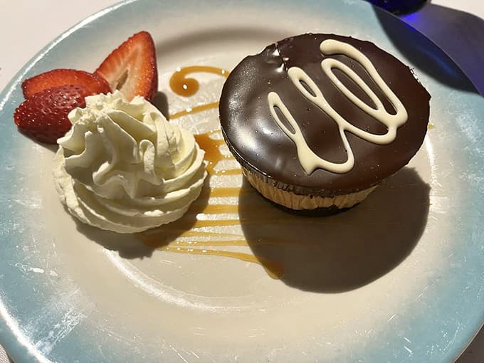 This chocolate cupcake looks almost too pretty to eat, but let's be honest, that hesitation lasts about two seconds.
