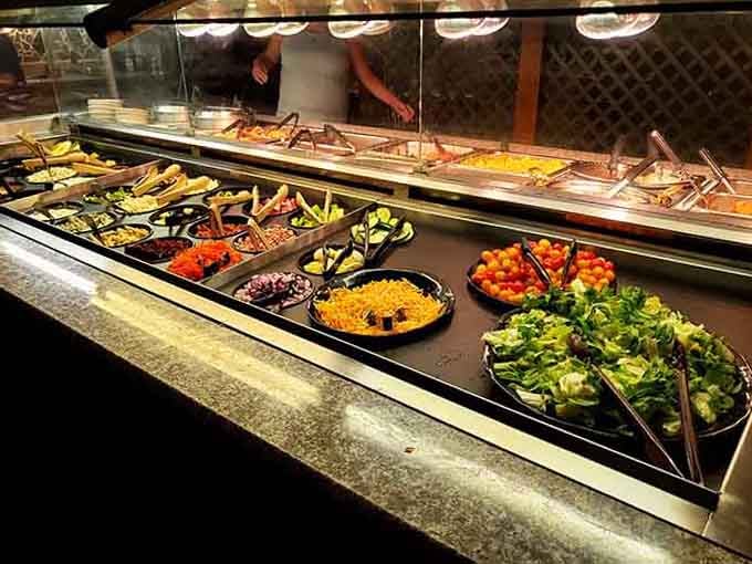 Fresh greens and vibrant vegetables line the salad bar, offering healthy options that actually look appetizing for once.