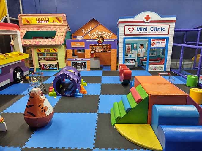 Miniature storefronts teach life skills through play, where pretend groceries and doctor visits feel wonderfully real.