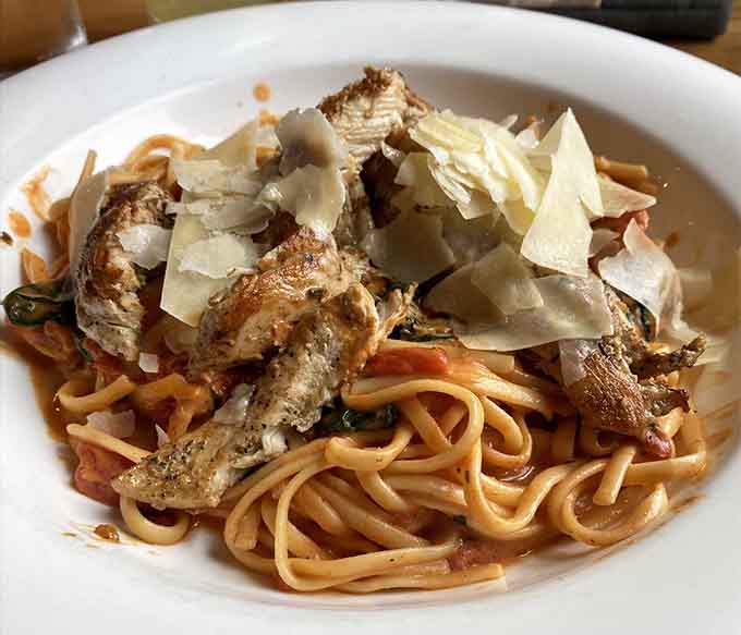 Linguine Rosa topped with shaved cheese delivers Italian comfort in every perfectly twirled forkful.