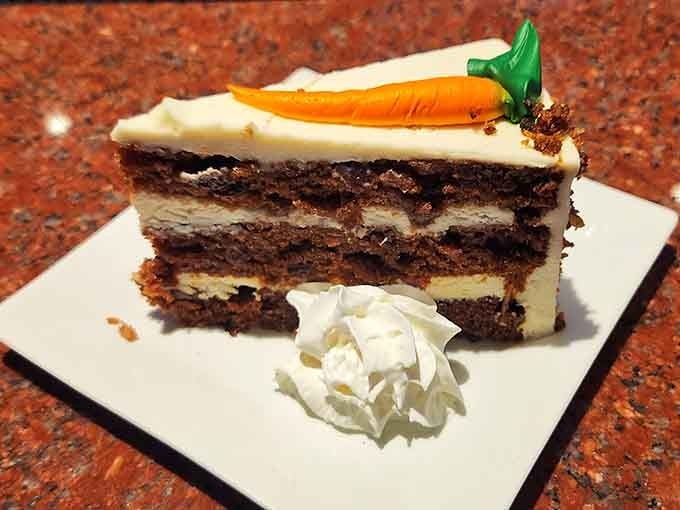 Carrot cake layers stacked high with cream cheese frosting, because vegetables totally count when they're in cake.