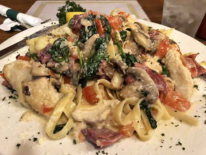 Chicken Florentine with pasta, spinach, and tomatoes brings Italian flair to this historic Maryland dining room beautifully.