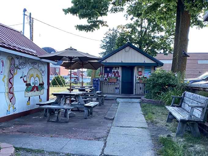 The patio offers prime people-watching while you tackle burgers that require both hands and determination.