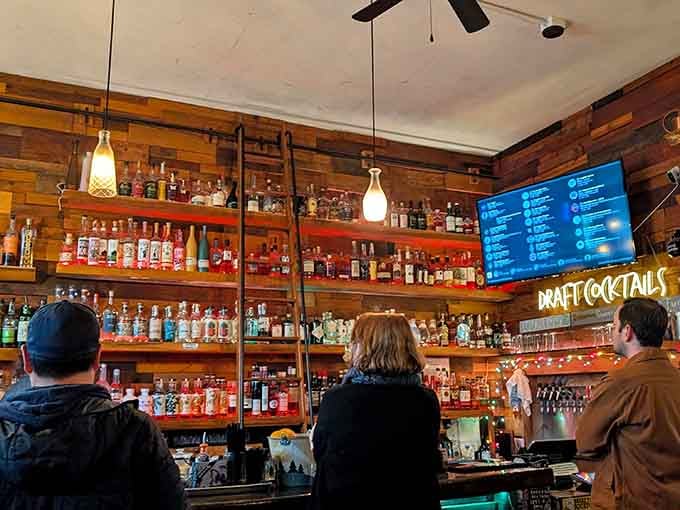 The well-stocked bar shelves promise craft cocktails that could lure even the shyest cryptid from the woods.