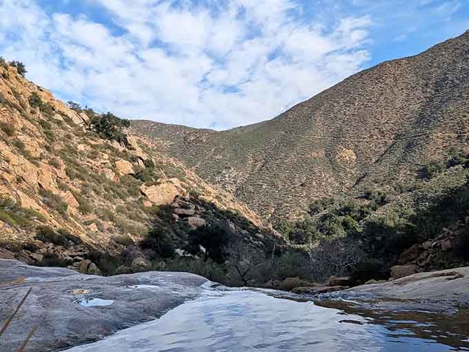 Smooth granite slopes leading down to hidden pools, nature's own water park without the lines or overpriced snacks.