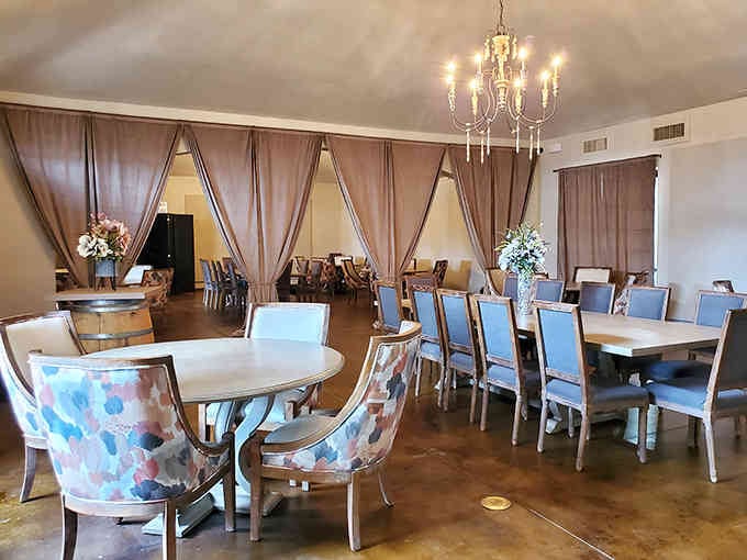 Draped curtains and crystal chandeliers transform this space into something worthy of your fanciest celebration or Tuesday.