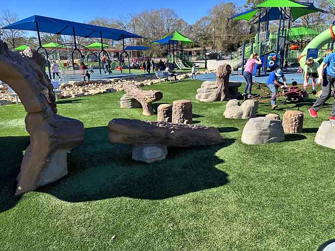 Natural play elements blend seamlessly with modern equipment, creating spaces where imagination runs absolutely wild.