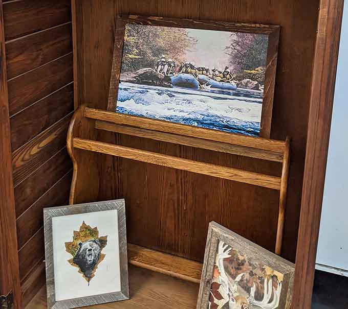 Framed artwork featuring local wildlife and landscapes brings the outside in, minus the bugs and unpredictable weather patterns.
