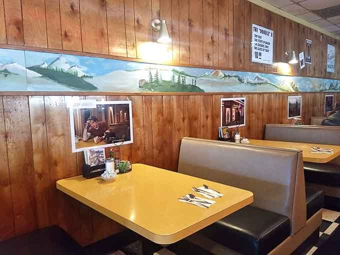 Wood paneling and mountain murals create a cozy Pacific Northwest atmosphere that feels authentically local without trying too hard.