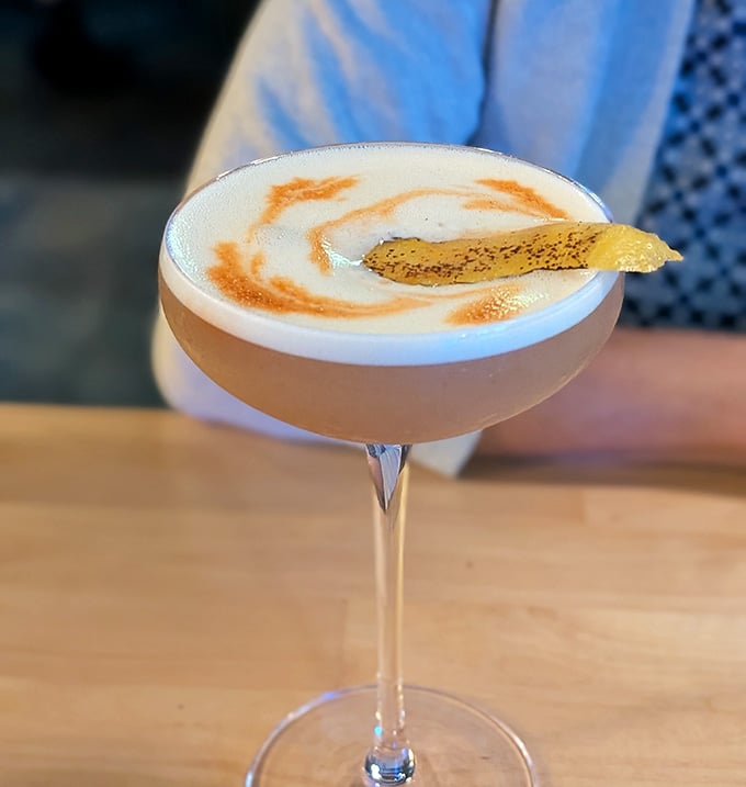 This elegant martini with its artistic garnish shows the bartenders here take their craft seriously indeed.