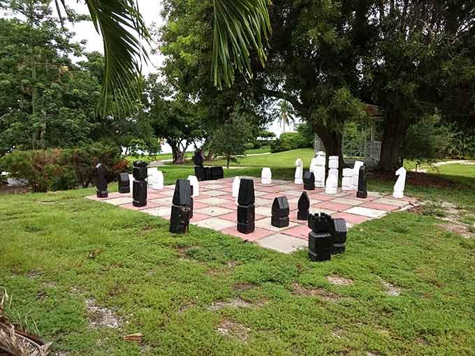 Giant chess pieces stand ready for strategic battles, though most players get distracted by the stunning waterfront views mid-game.