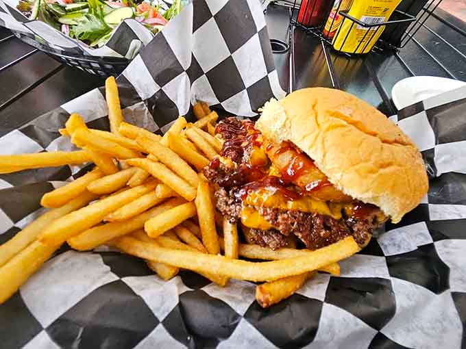 A juicy burger with melted cheese and crispy fries in a checkered basket&mdash;sometimes the classics just can't be improved upon.