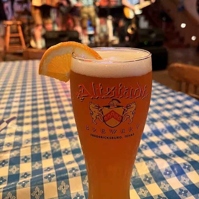 Local craft beer served with an orange slice brings Texas brewing traditions into this German dining experience.