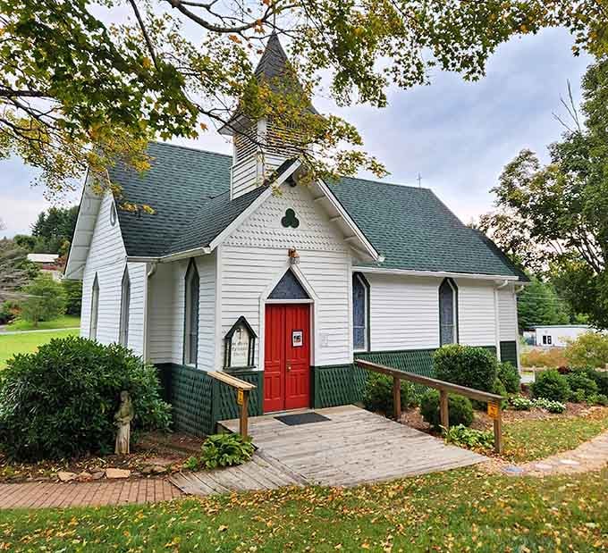 Saint Mary's Church stands white and welcoming, its red door inviting like a postcard from simpler times.
