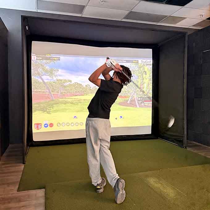 Indoor golf simulators let you practice your swing without losing balls in the woods or your dignity.