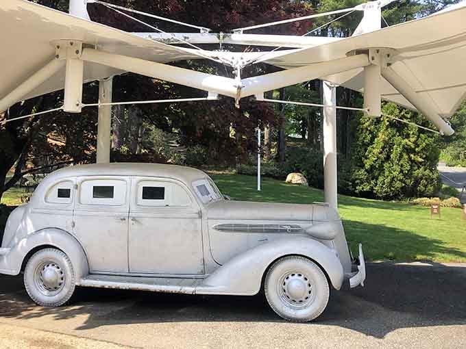 A vintage car gets the sculpture treatment, proving that classic automobiles look good in any medium, even solid metal.