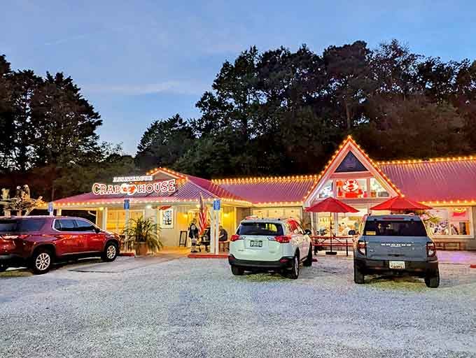 The festive string lights wrapped around this cheerful building create an atmosphere that's pure summer joy.