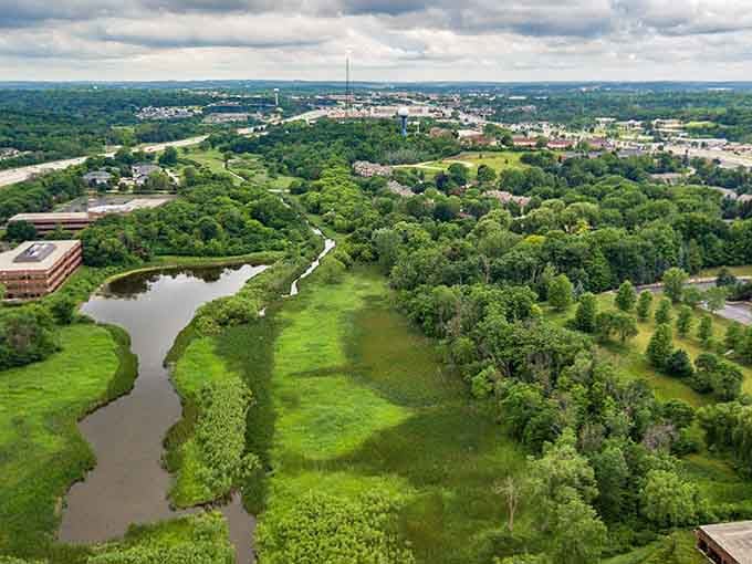 Manicured landscapes welcome visitors to a community that takes pride in every detail, from flowers to fountains.