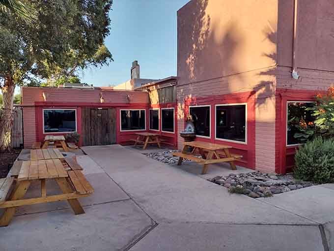 The cheerful red exterior and casual picnic tables invite you to relax and enjoy outstanding beef.