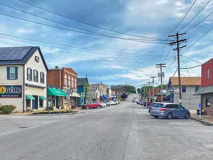 Colorful buildings march up the hillside like a rainbow decided to settle down and open some shops.