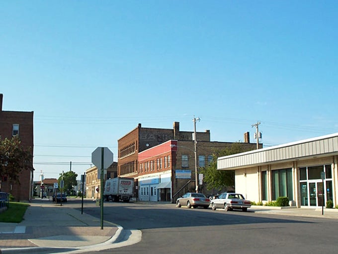 Sturdy brick structures line quiet streets where parking spots outnumber the cars most days.