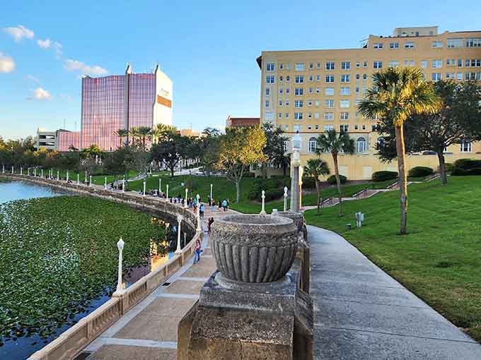 That decorative urn anchors a walkway where locals stroll like they're extras in a feel-good movie.