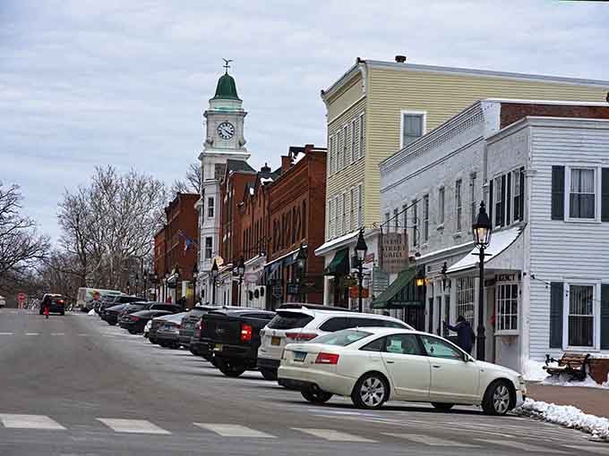 The clock tower presides over downtown like a patient timekeeper reminding everyone that rushing went out of style here.