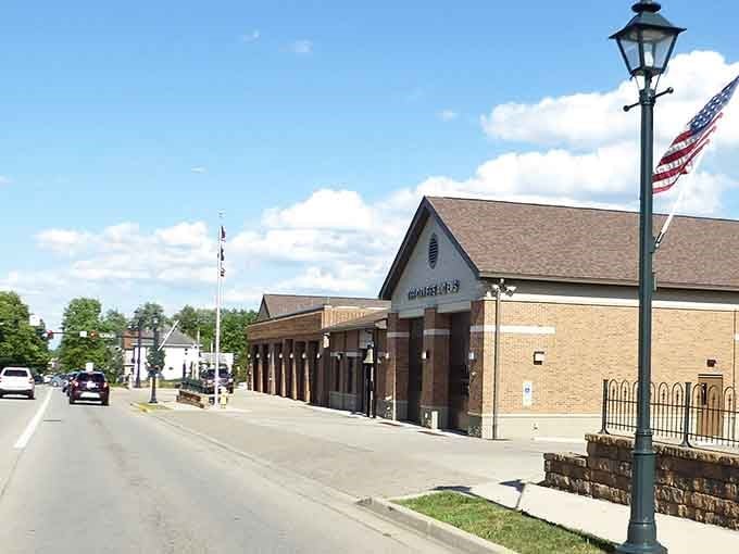 Gas lamps and pristine sidewalks create an atmosphere where every stroll feels like a step into simpler times.