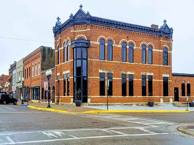 Ornate blue trim crowns this corner building like jewelry on a grande dame dressed for Sunday service.