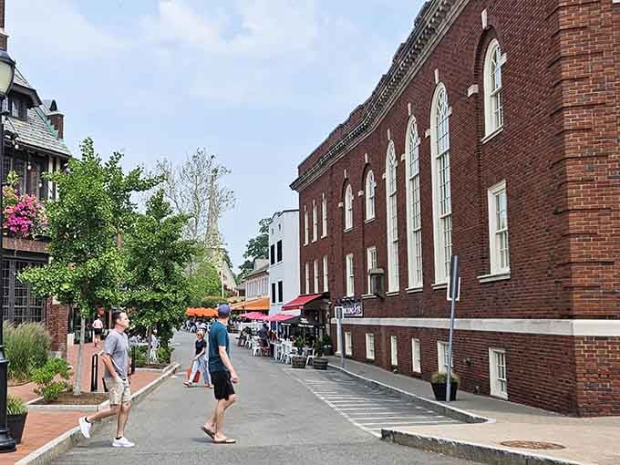 Stroll down this charming, brick-lined street where historic architecture and inviting outdoor seating create the perfect atmosphere for exploring Westport.