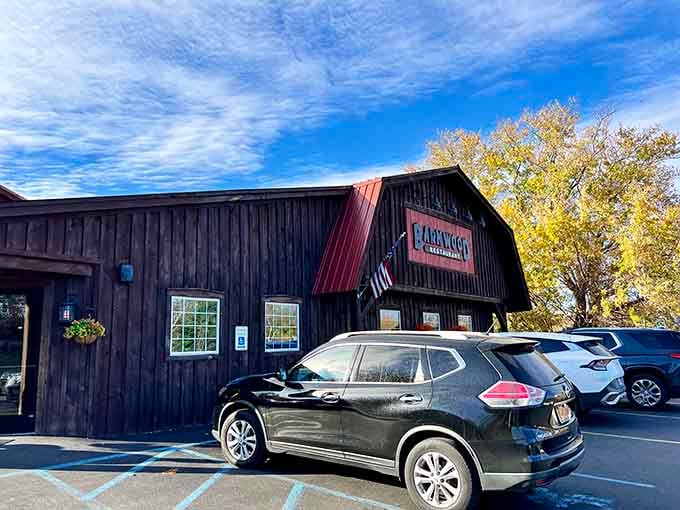 That weathered barn exterior hides hearty comfort food inside, where the rustic charm matches the generous portions on every plate.