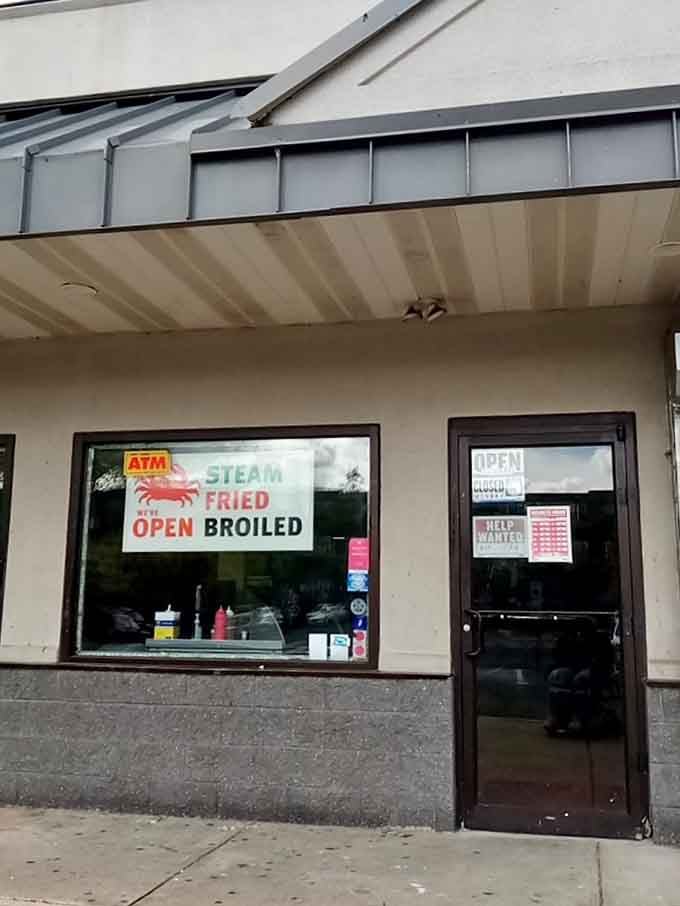 Simple storefront windows advertise steamed, fried, and broiled options for folks who appreciate honest seafood done right, period.