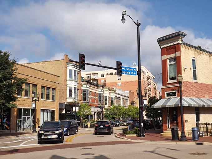 Brick storefronts create an inviting urban village atmosphere where pedestrians outnumber worries on these friendly streets.
