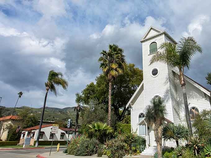 That pristine white chapel surrounded by palms proves that paradise isn't always tropical, sometimes it's just beautifully peaceful.