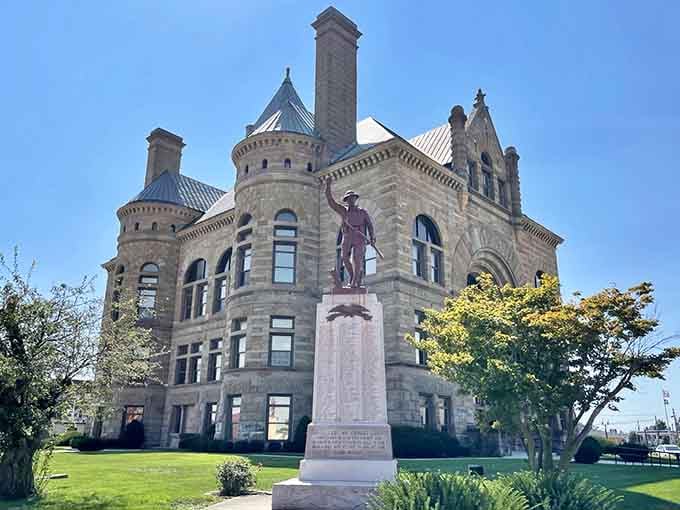 The castle-like turrets and statue create a scene so majestic, you'd swear you took a wrong turn into Europe.